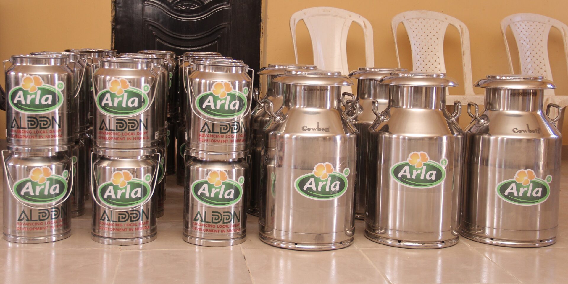 Local dairy farmers excited, as Arla Foods distributes milk cans to ...