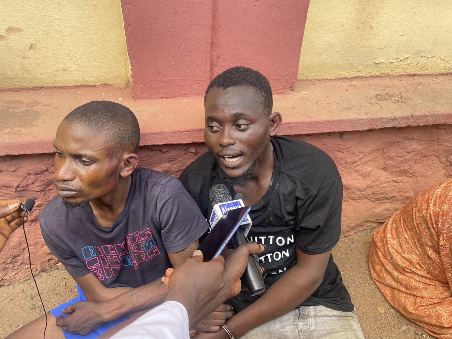 Police parade suspects in New Year's Day murder of three family members ...