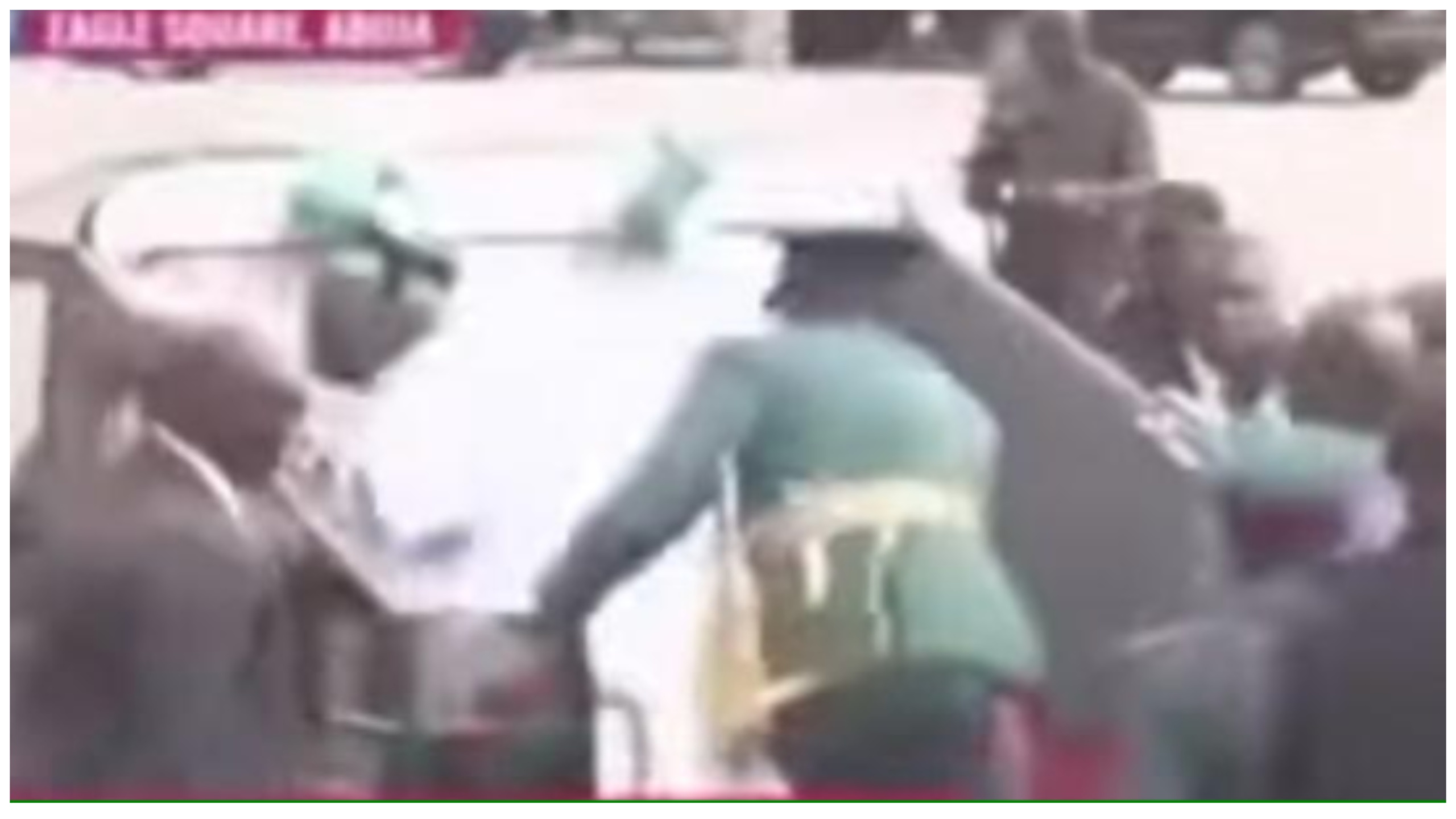 Tinubu slips, falls at Democracy Day event; Atiku, others react